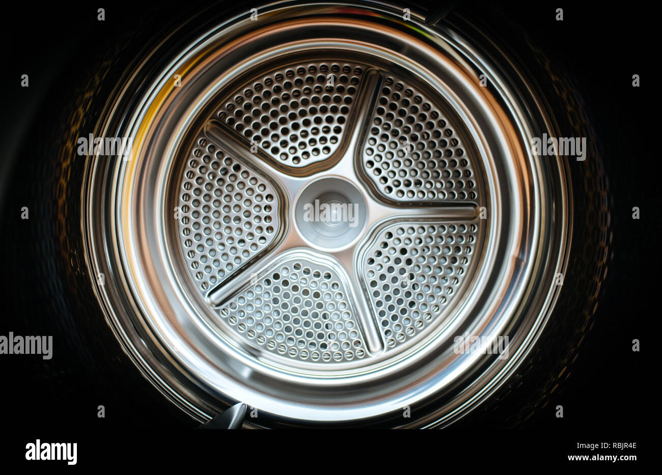 Steel part of the tumble of a modern new front-load clothes dryer ...