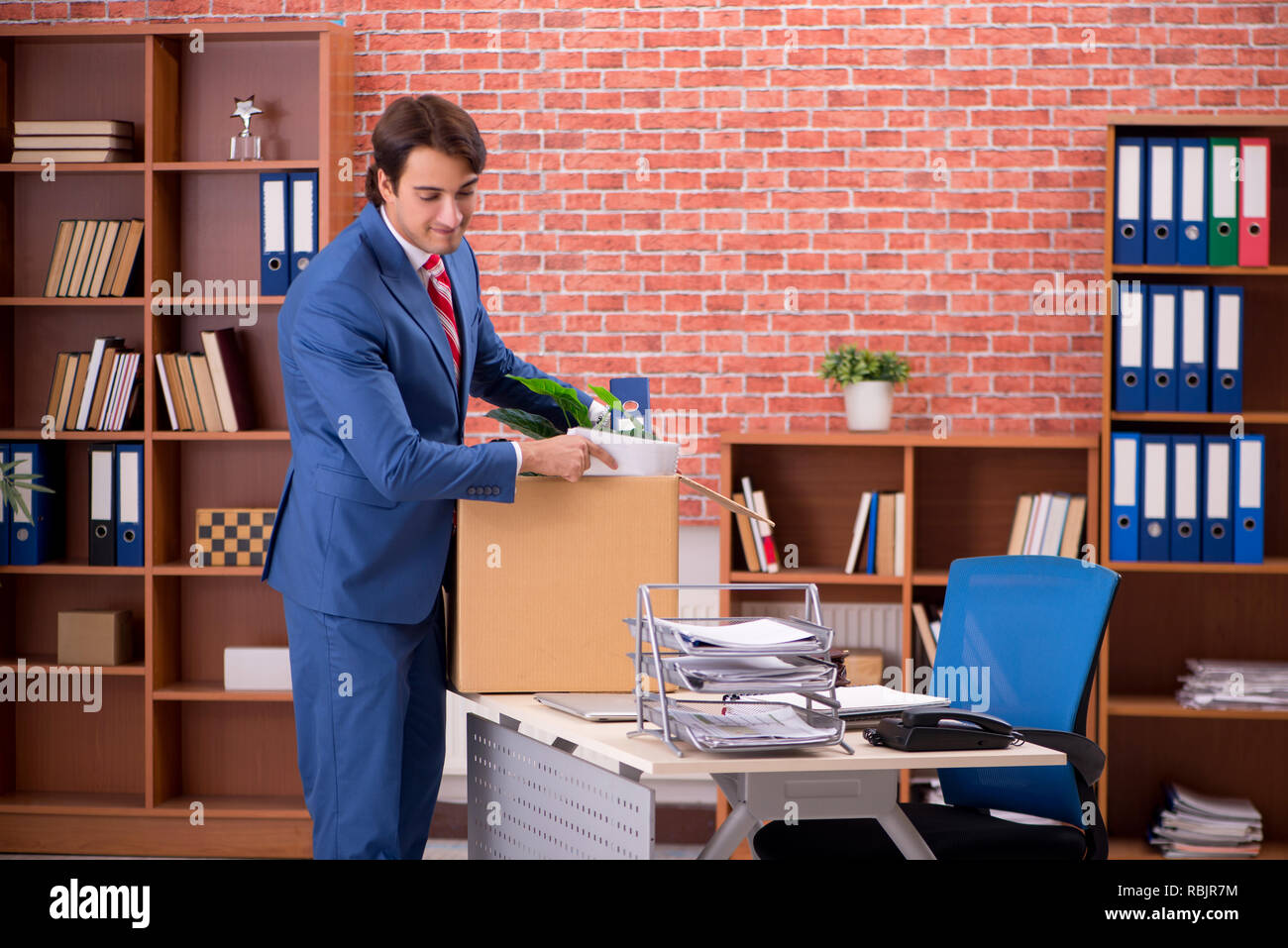 Successful employee getting new job position Stock Photo - Alamy