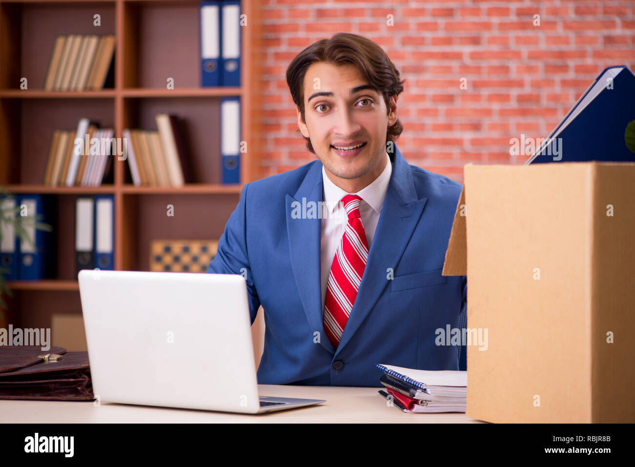 Successful employee getting new job position Stock Photo - Alamy