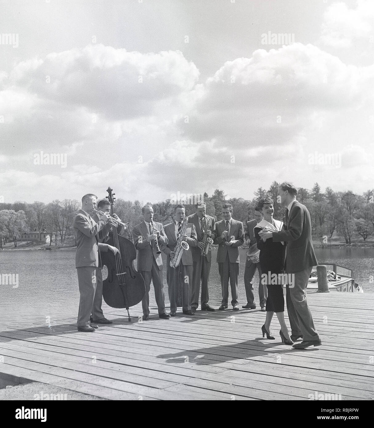 Old man young playing bridge hi-res stock photography and images - Alamy