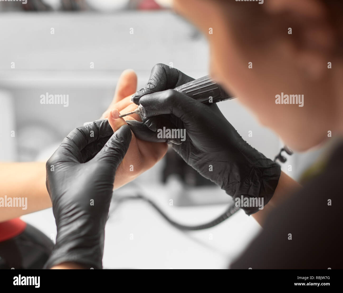 Master in process making manicure hi-res stock photography and images ...
