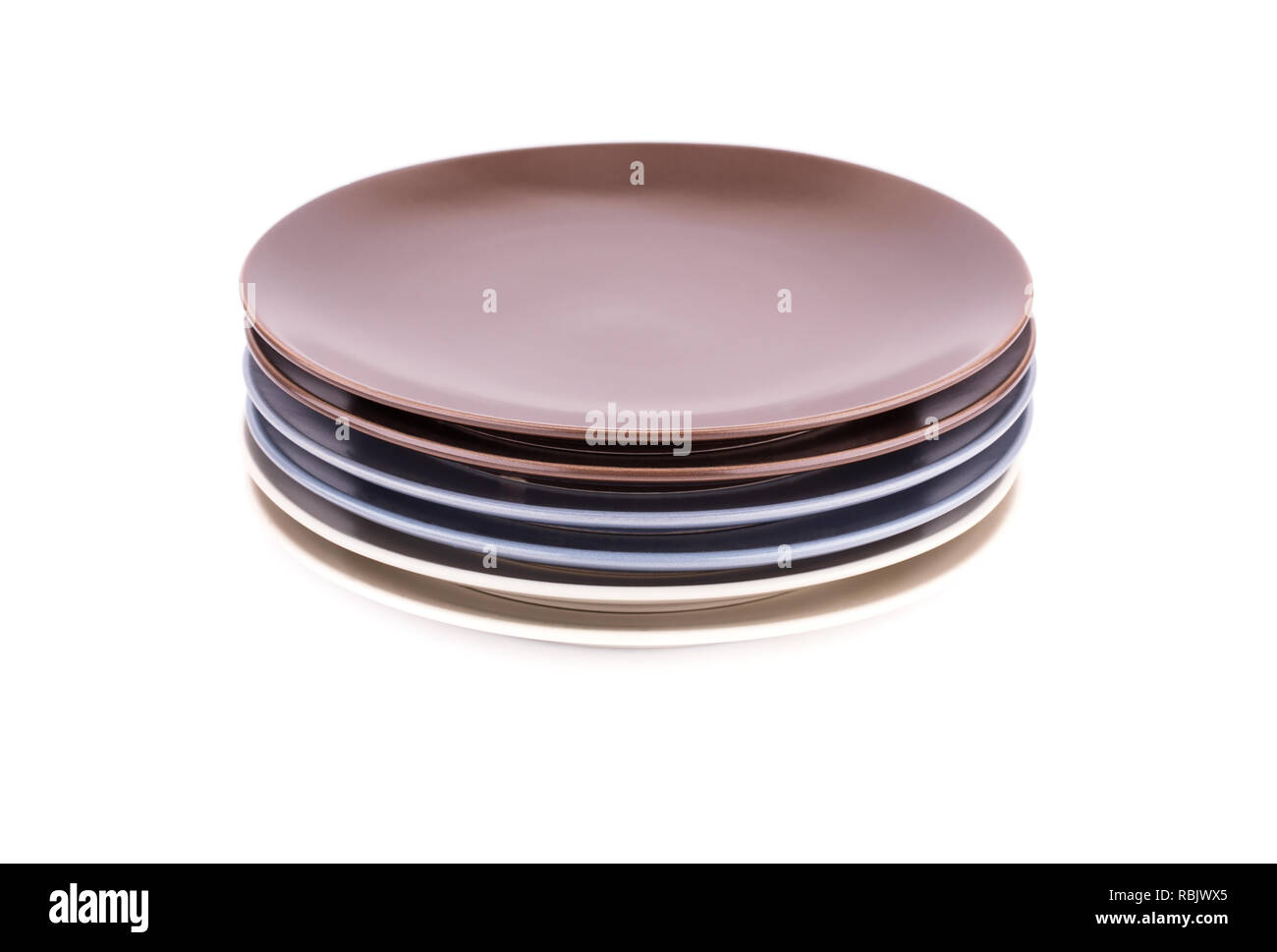 Stack of colorful plates isolated on white background Stock Photo - Alamy