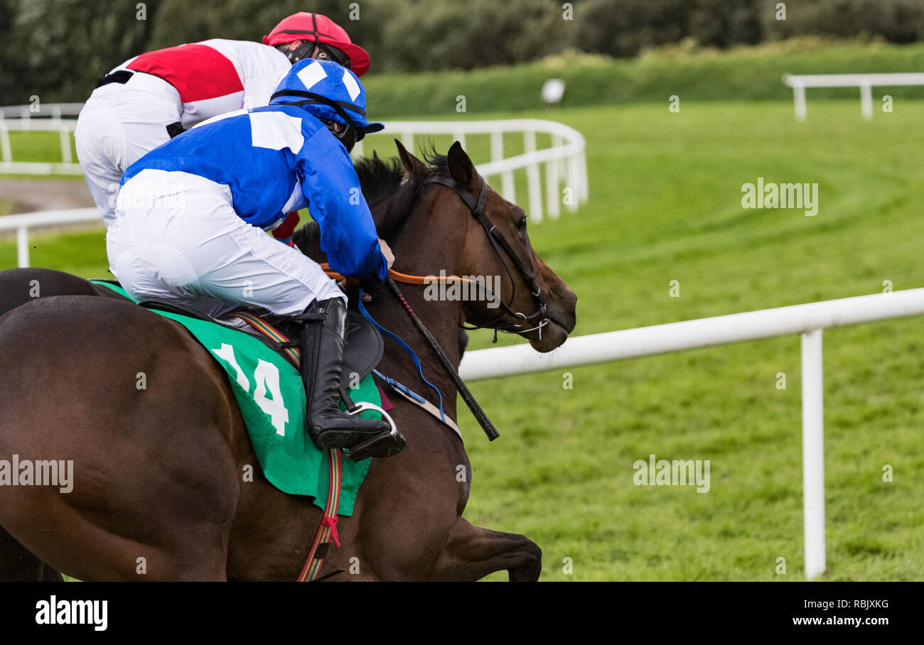 Two race horses with jockeys hi-res stock photography and images - Alamy