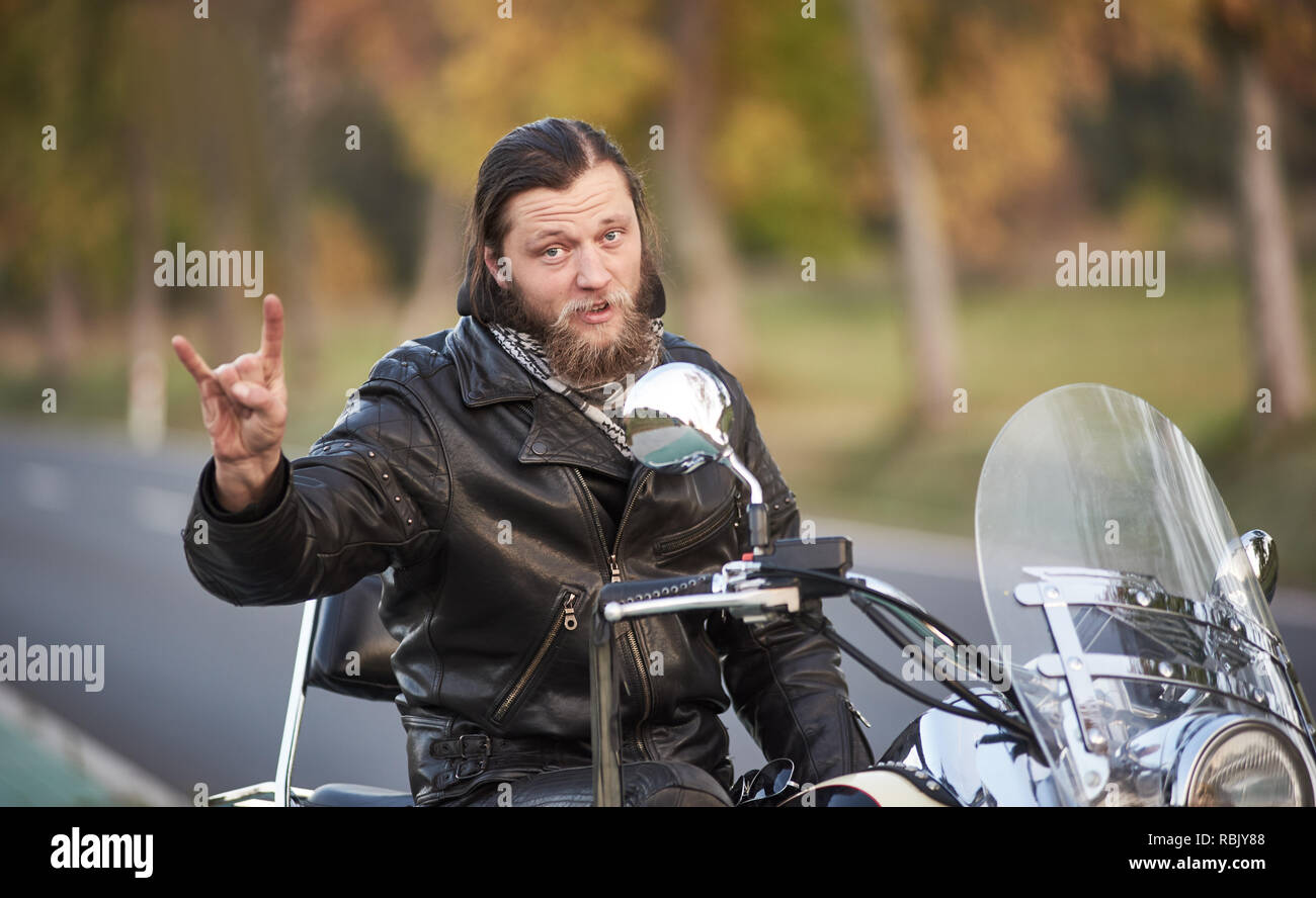 Cool guy on motorcycle hi-res stock photography and images - Alamy