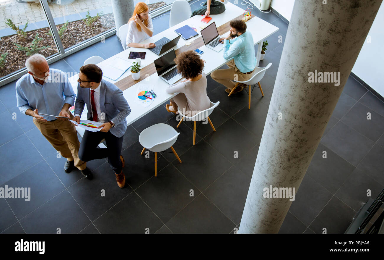 Top view at business people working in the office Stock Photo - Alamy