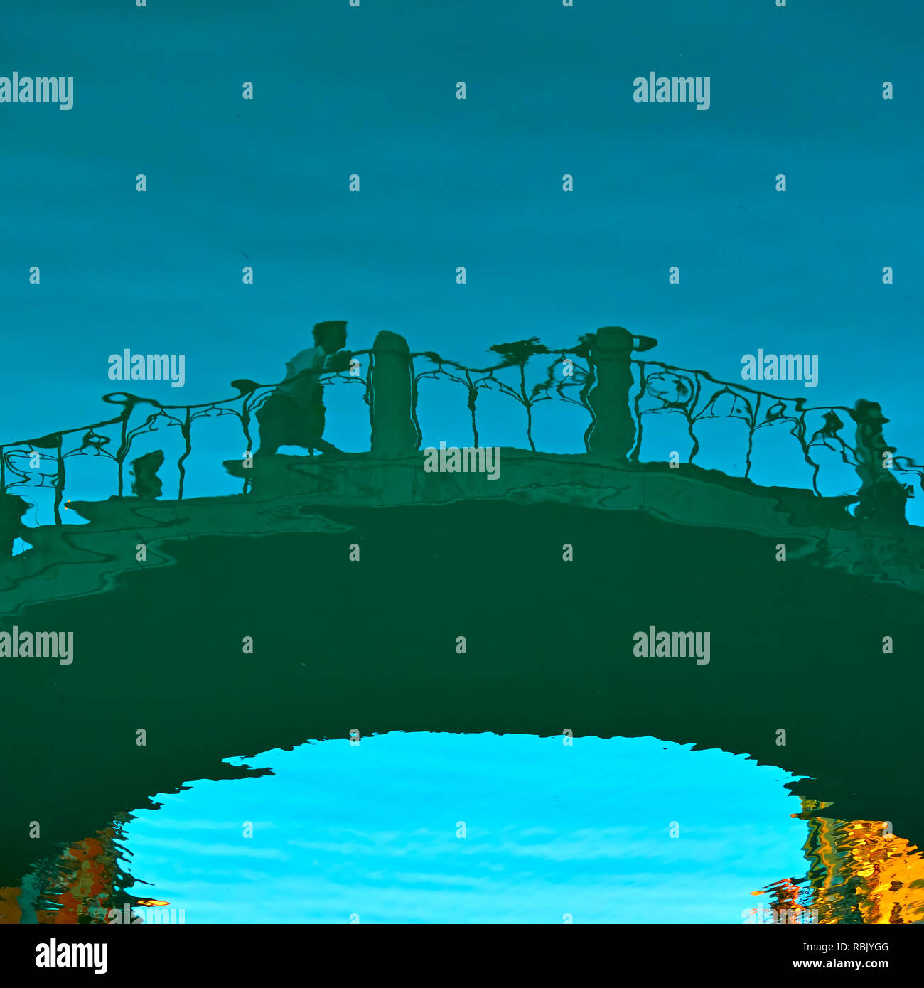 Inverse image of water surface of venetian canal with reflaction of a ...