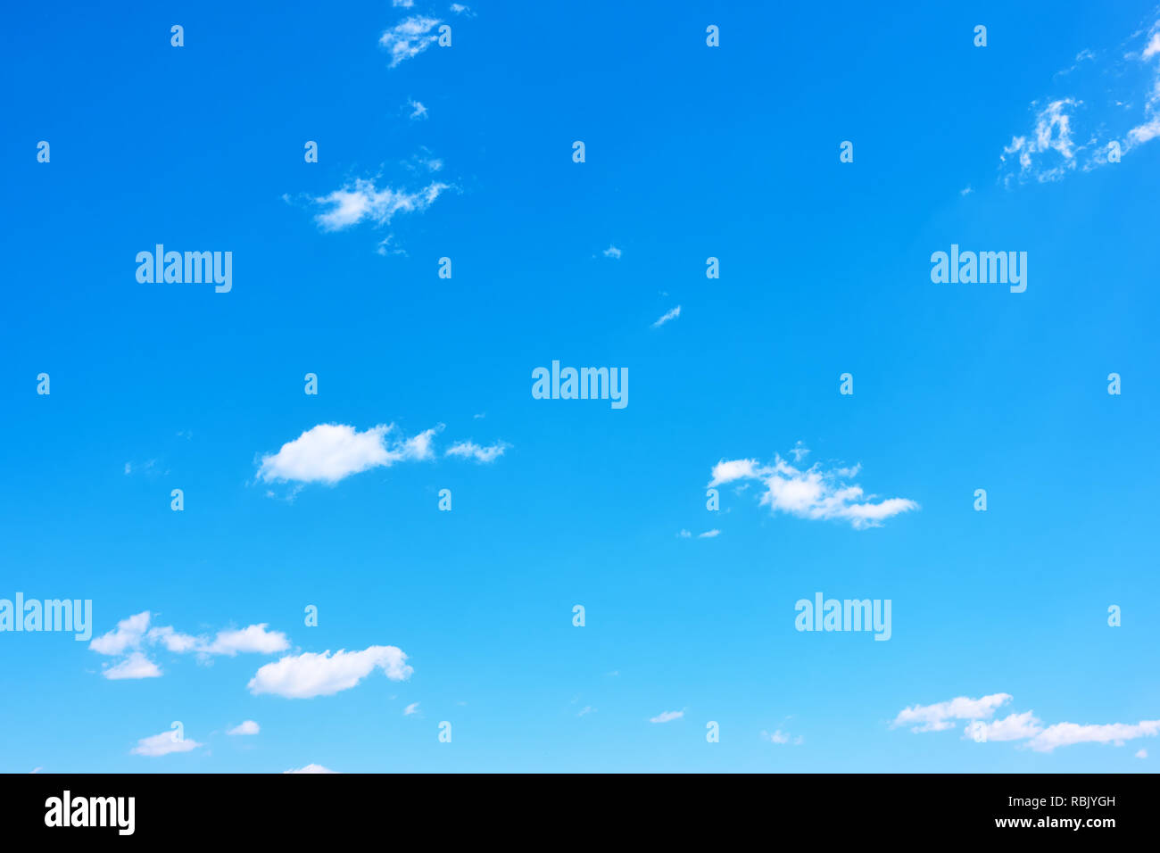 Almost clear spring blue sky - natural background with large space for ...