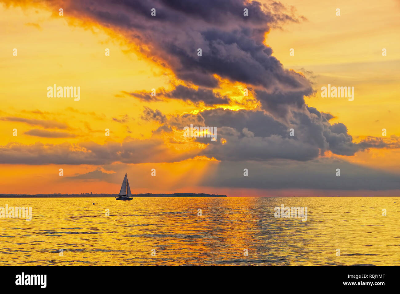 Beautiful sunset at the sea with dramatic sky hi-res stock photography ...