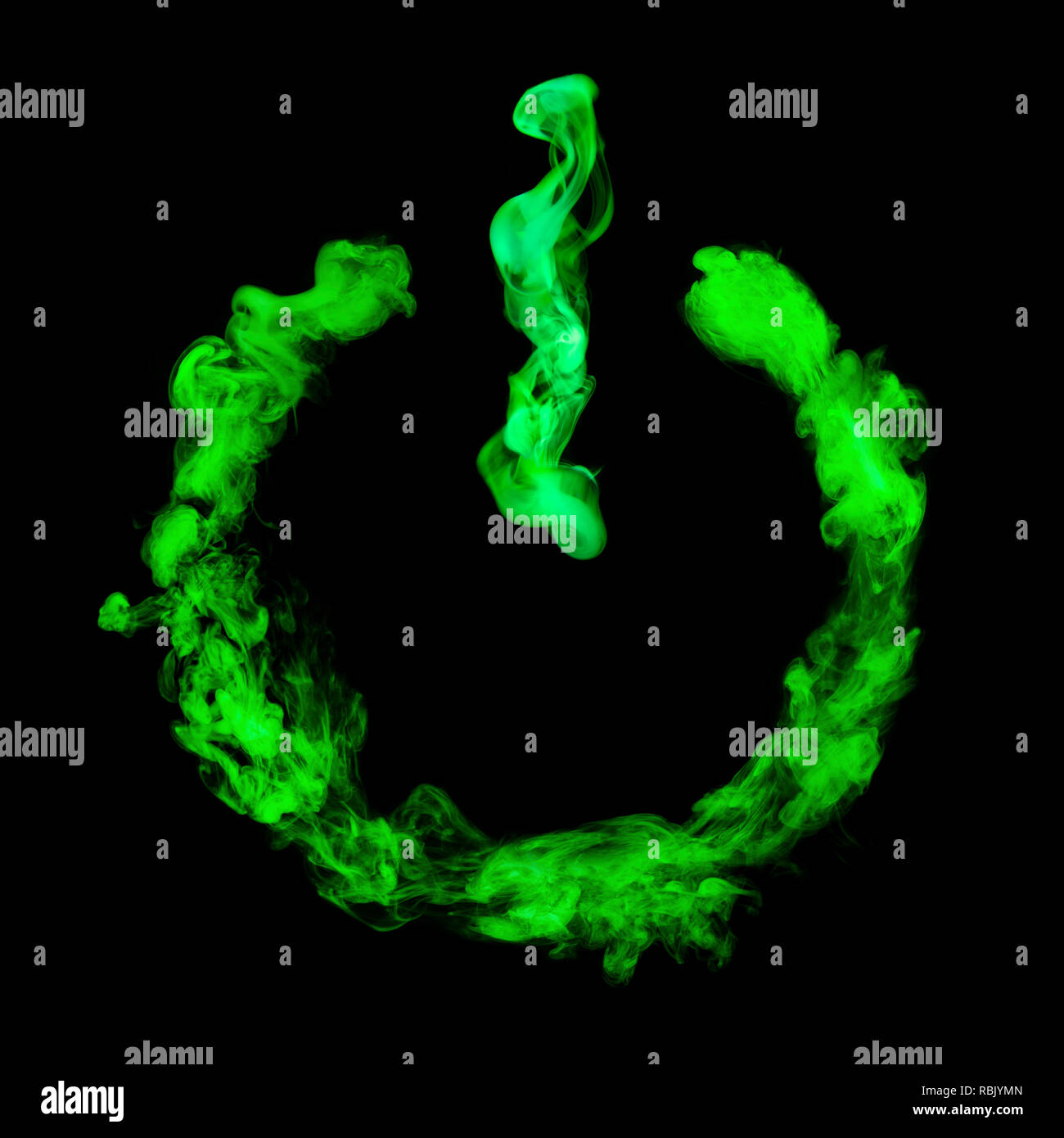 on sign button from green colorful smoke isolated on black background ...