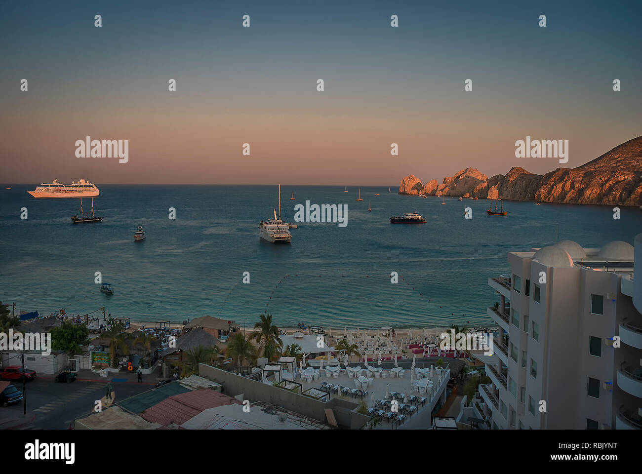 A cruise ship at anchor in the bay at Cabo San Lucas, Baja California ...