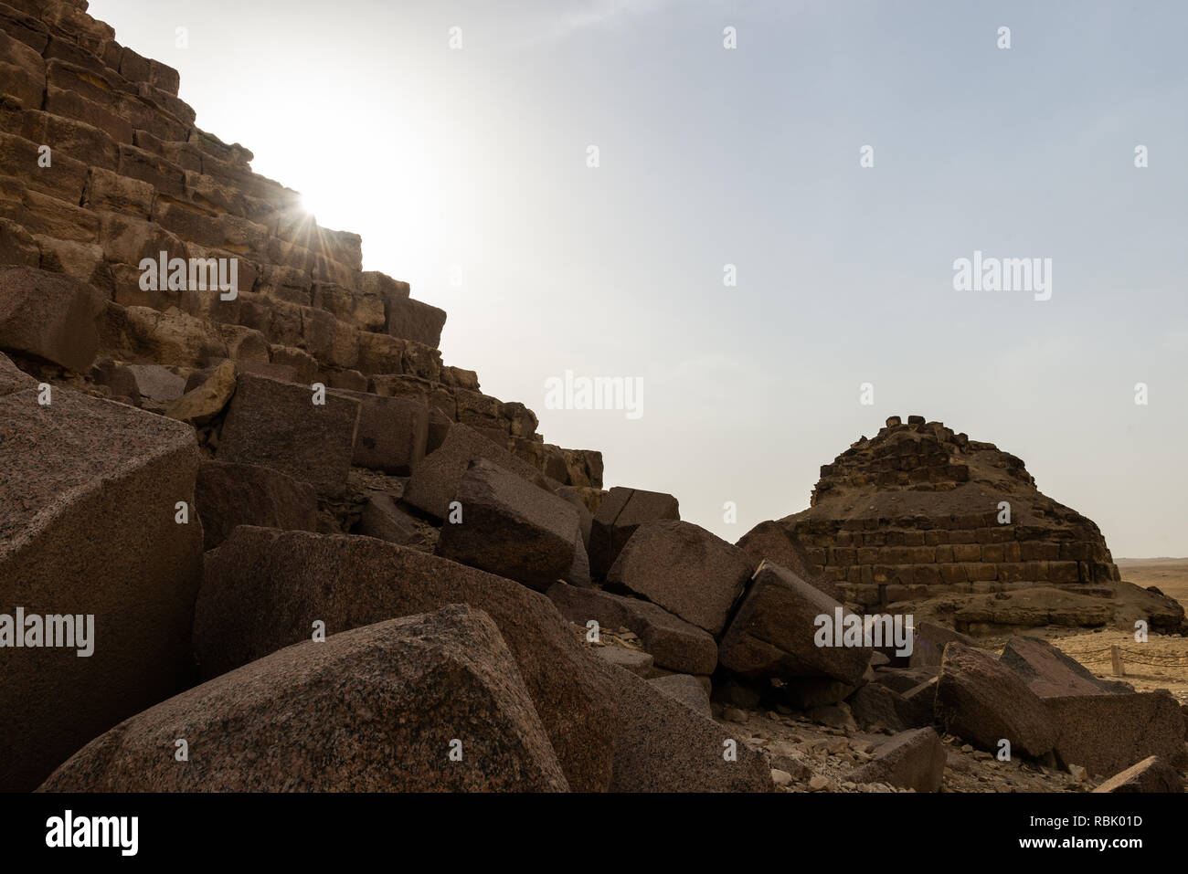 Star of sunlight beams falling on the edge of the pyramid of Menkaure ...