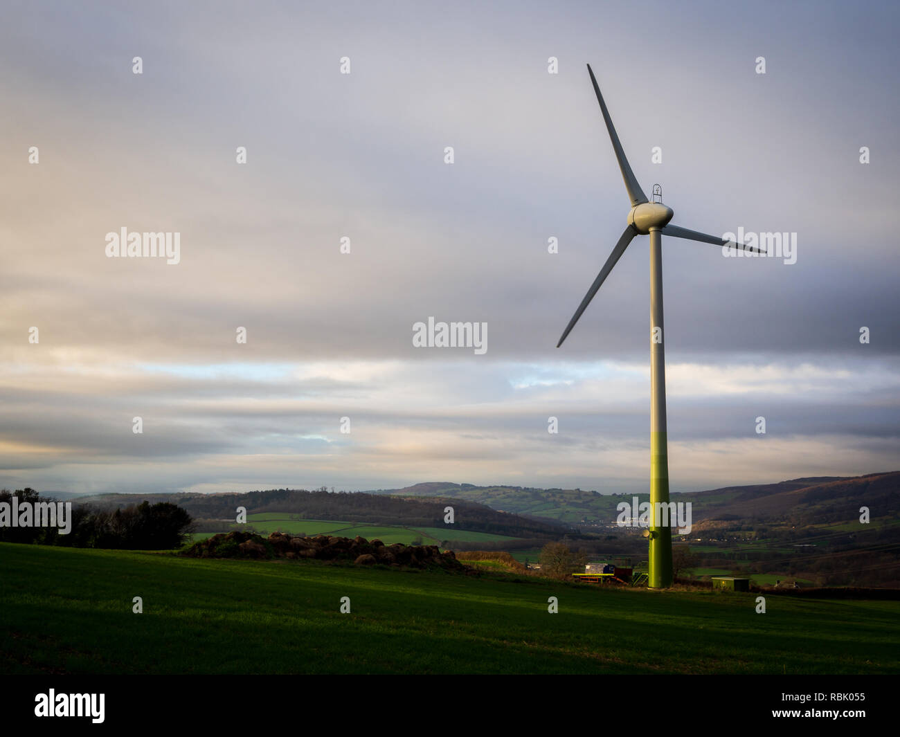 Alternative energy source. Rural landscape farm with a single windmill ...