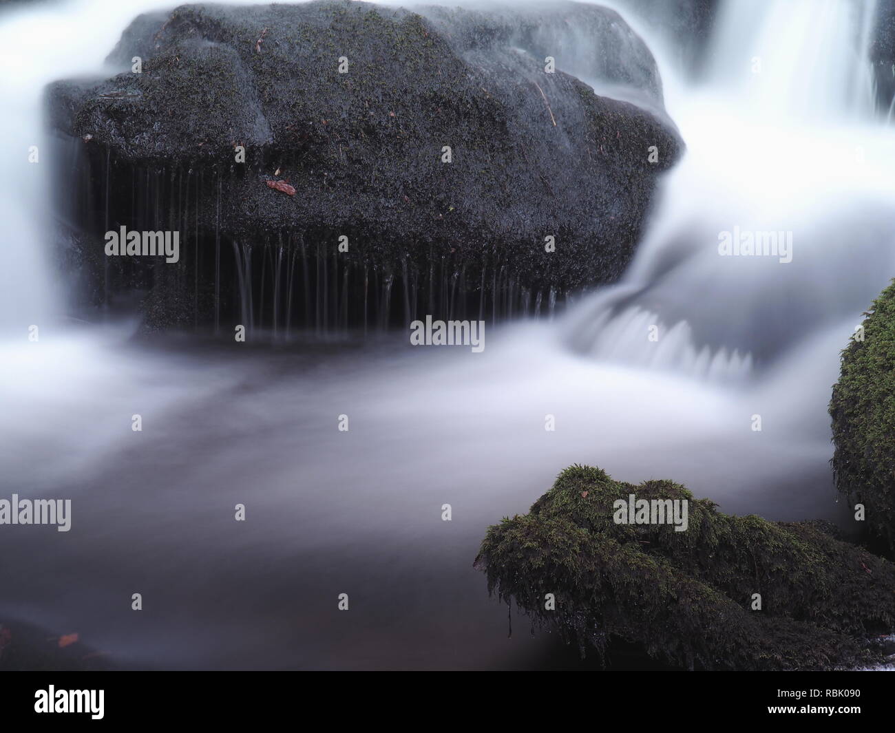 rocks in a stream after heavy rainfall in north wales Stock Photo - Alamy