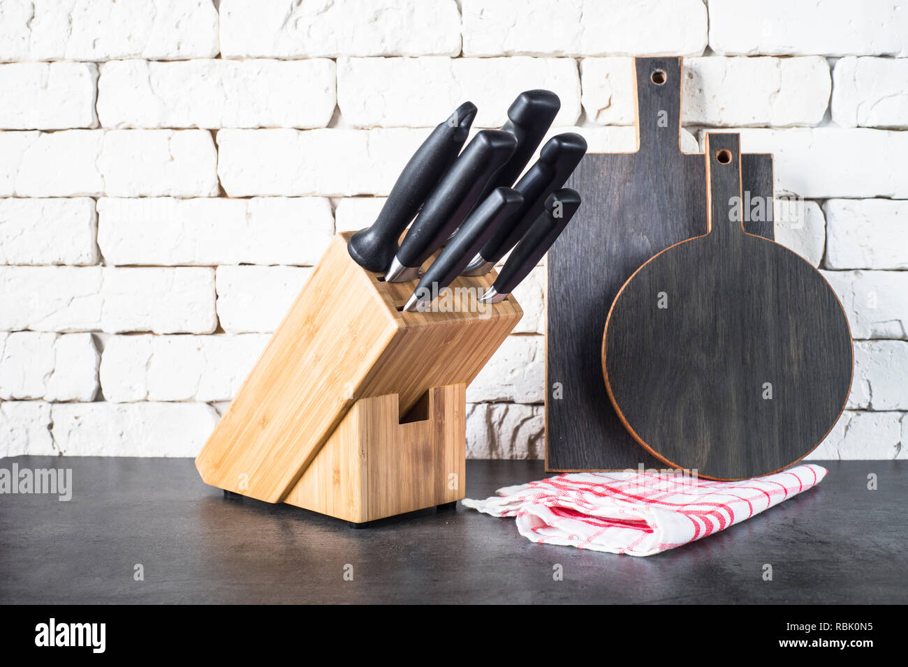 Knife block and utensil on the table Stock Photo - Alamy