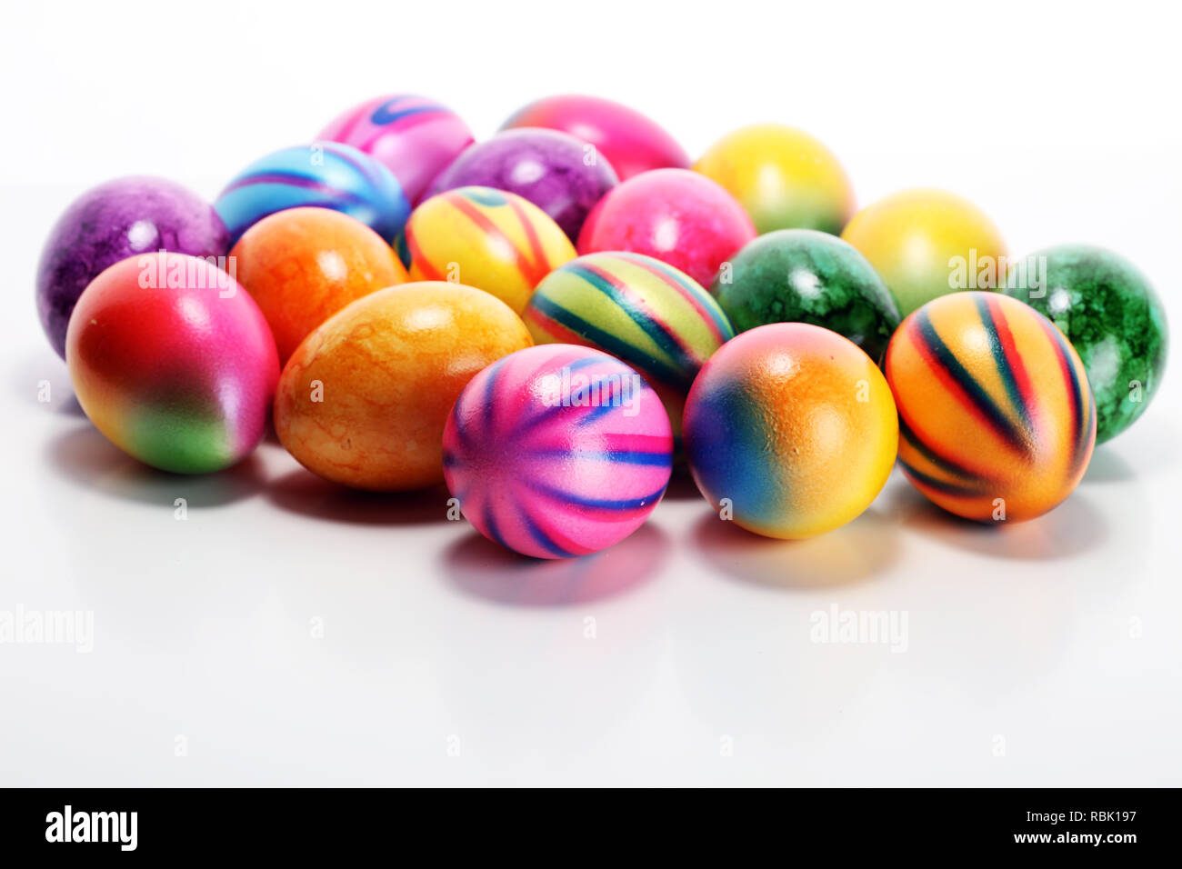 Row of Easter eggs on table. colorful easter decoration Stock Photo - Alamy