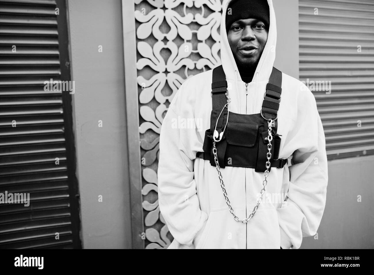 Stylish urban style african american man in pink hoodie posed. Afro ...