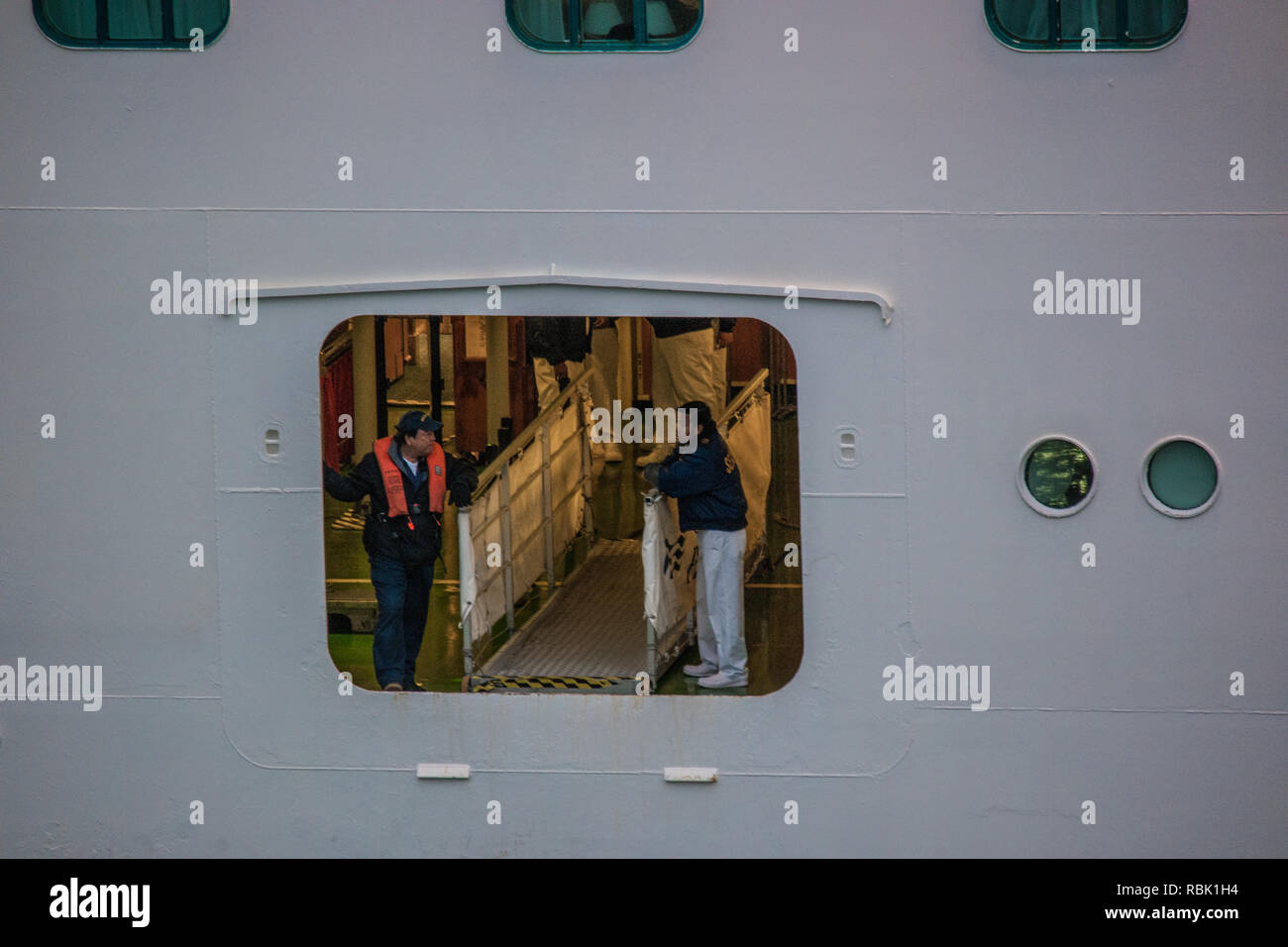 cruise ship workers and gangway Stock Photo - Alamy