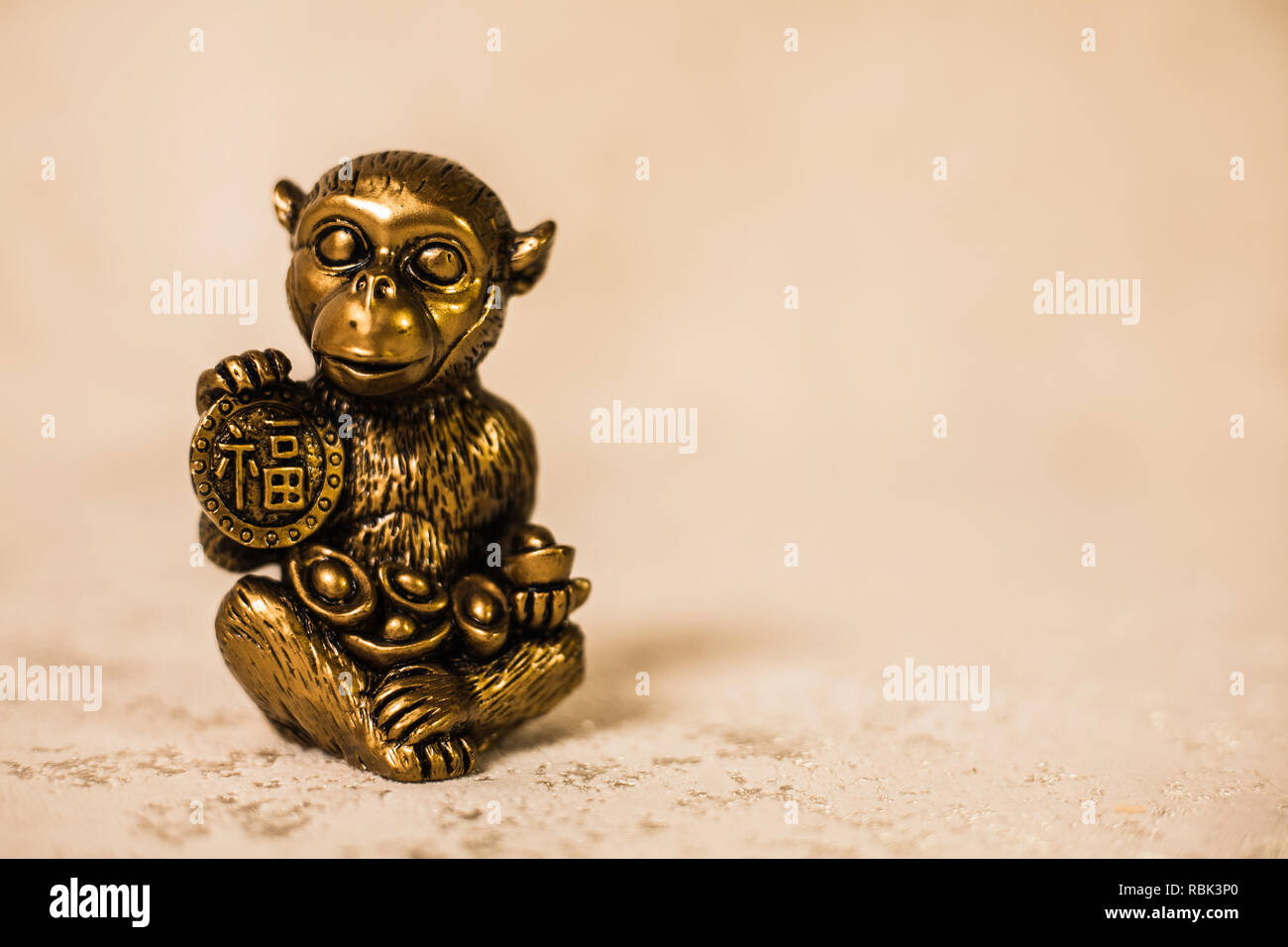 Ancient golden monkey Stock Photo - Alamy