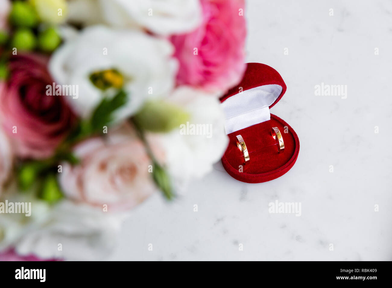 Wedding rings in a red velvet jewelry box Stock Photo - Alamy