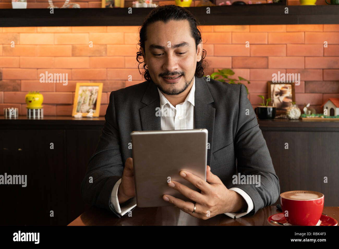Indian businessman using mobile app hi-res stock photography and images ...