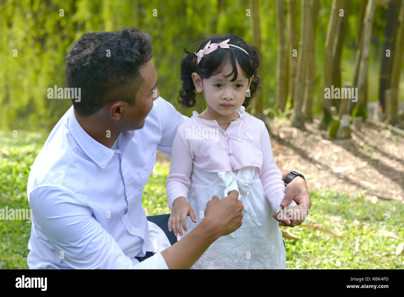 malay muslim father and daughter Stock Photo - Alamy