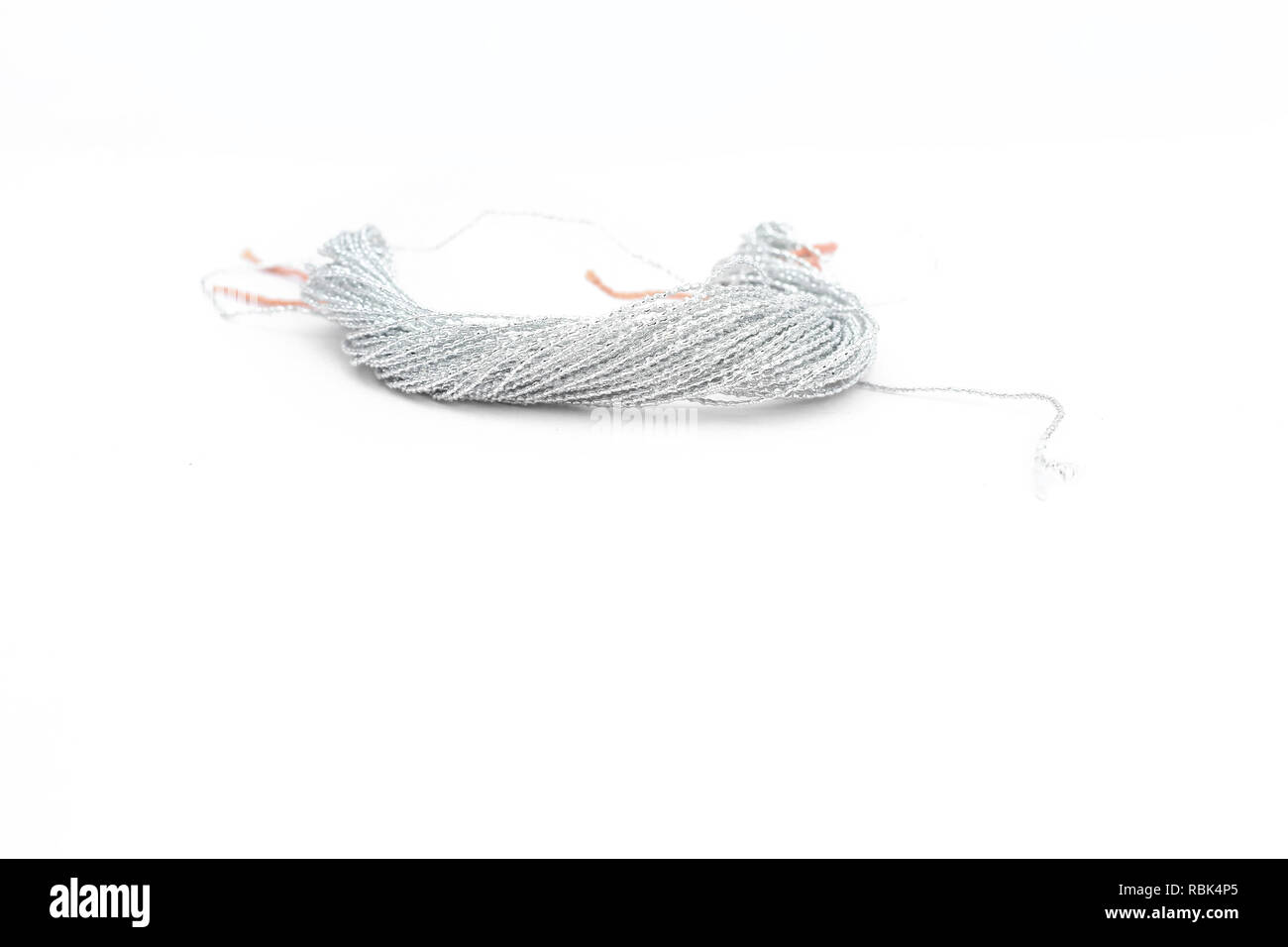 Picture of thread on the white background Stock Photo - Alamy