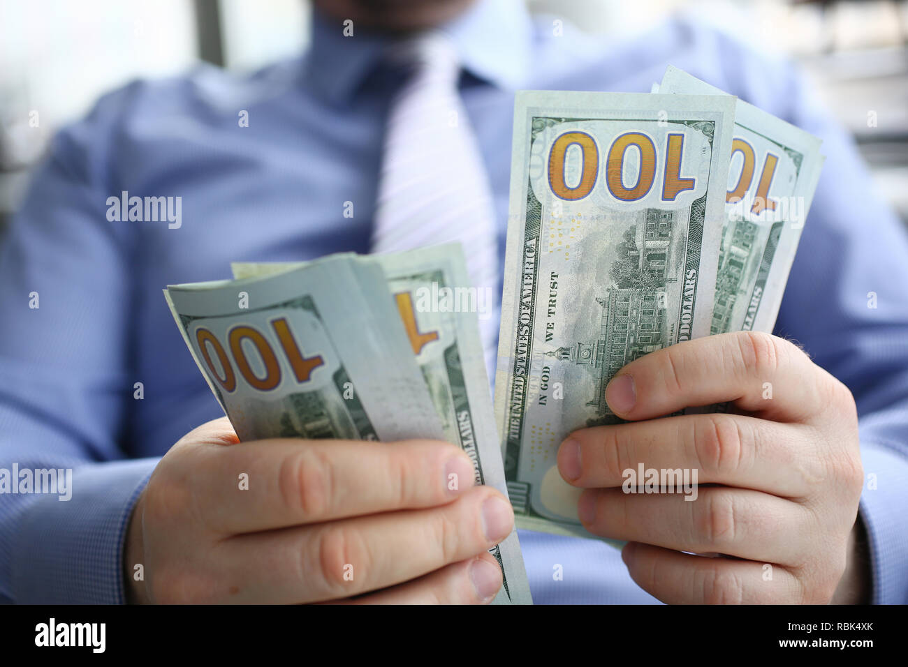 Businessman counting dollars work money hi-res stock photography and ...