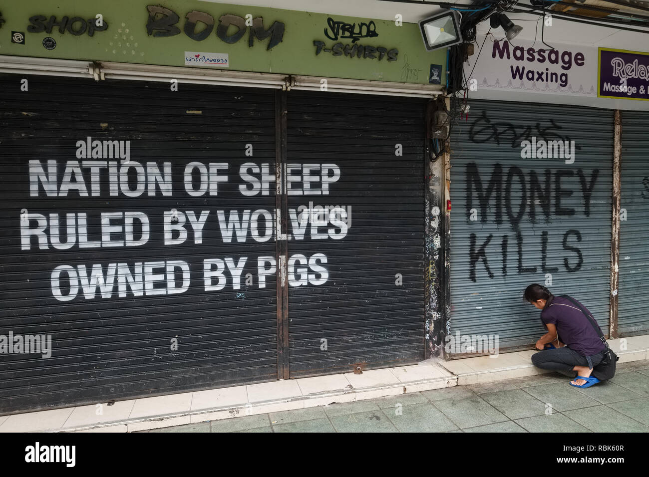 Shuttered shops in tourist street Khao San Rd. in Banglamphoo, Bangkok ...