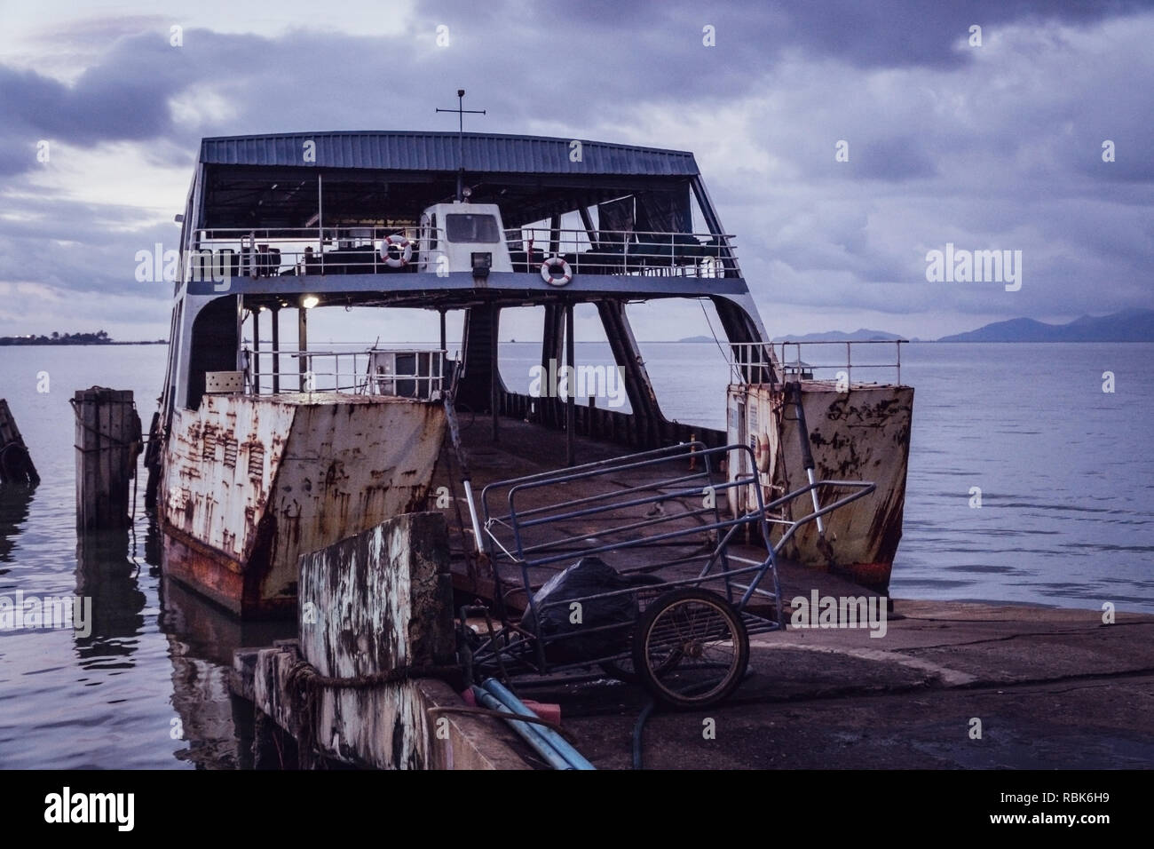Old rusty ferry boat for island hopping in Thailand Stock Photo - Alamy
