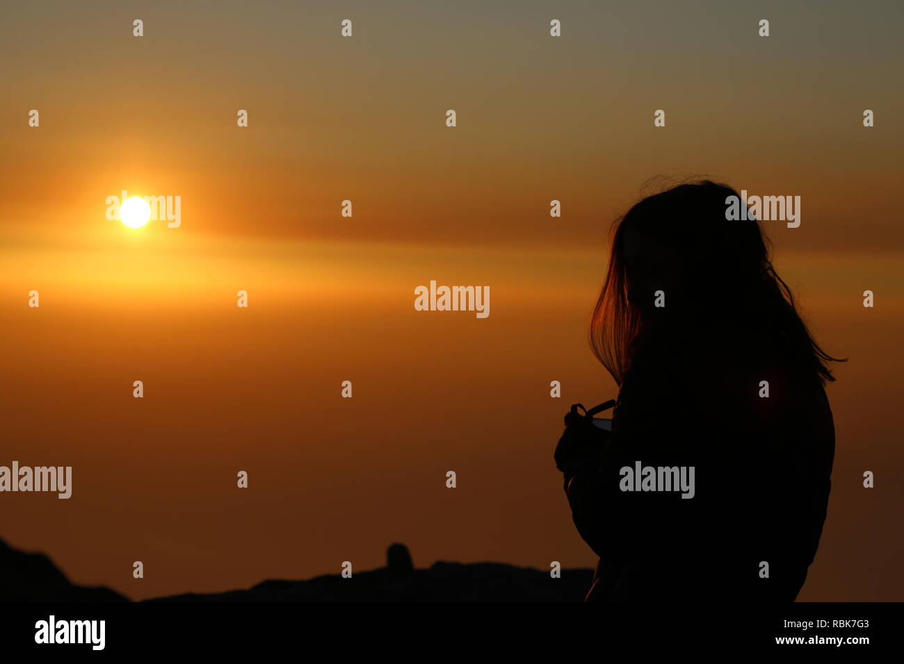 Lady in sunnet hi-res stock photography and images - Alamy