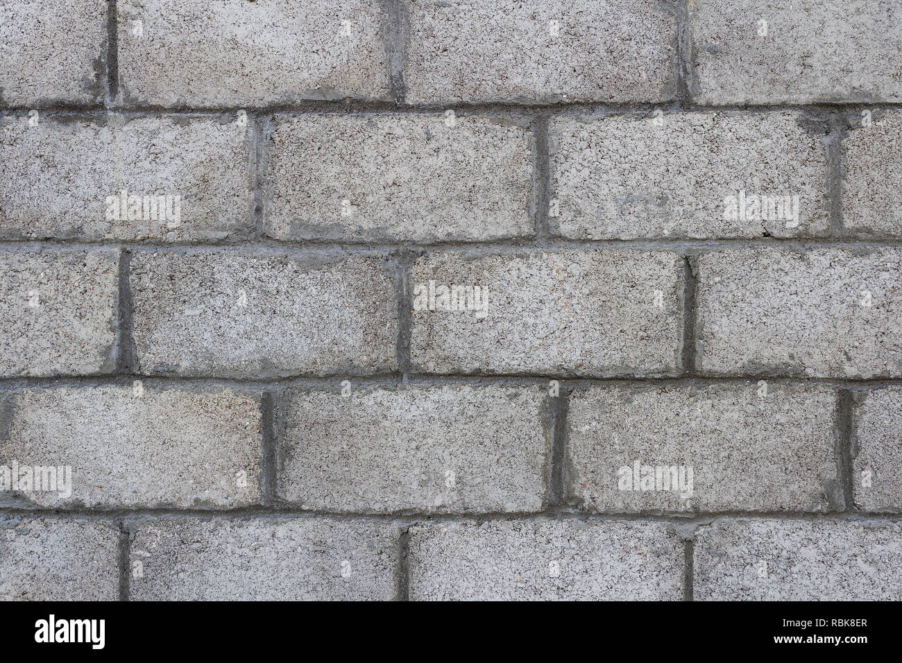 Closeup of grey block wall Stock Photo - Alamy