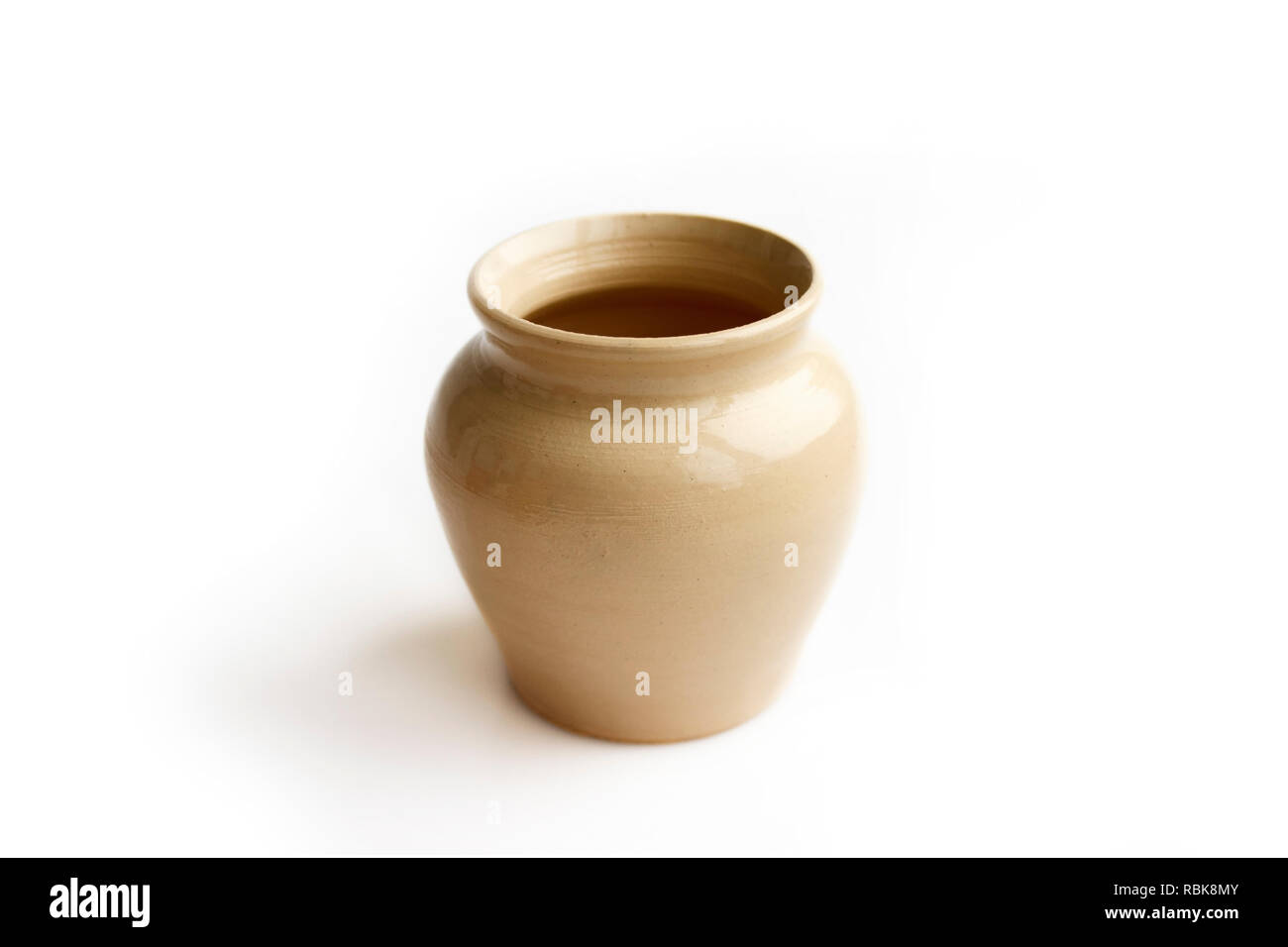 Clay pot, made by hand on a potter's wheel from white clay. Double ...