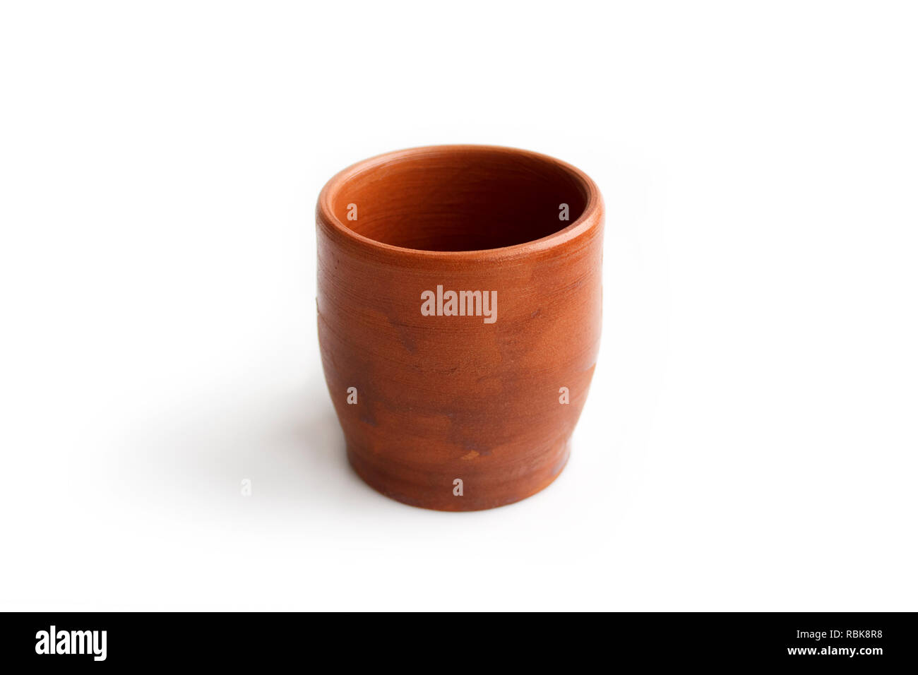 Clay glass, made by hand on a potter's wheel from red clay. Double ...