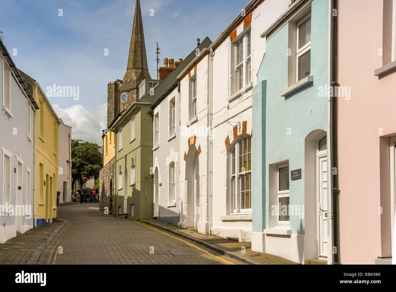 TENBY, PEMBROKESHIRE, WALES - AUGUST 2018: Painted houses in one of the ...