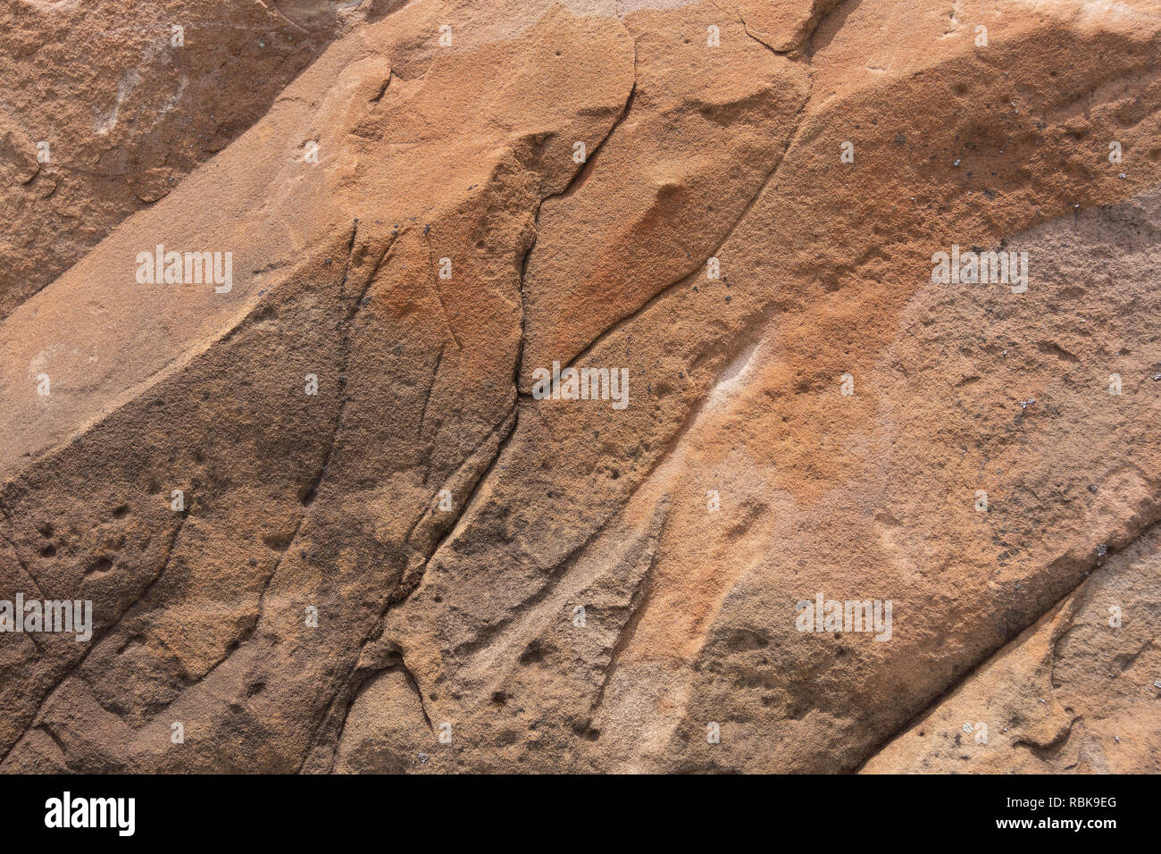 Natural light brown stone with a relief surface. Rock texture Stock ...