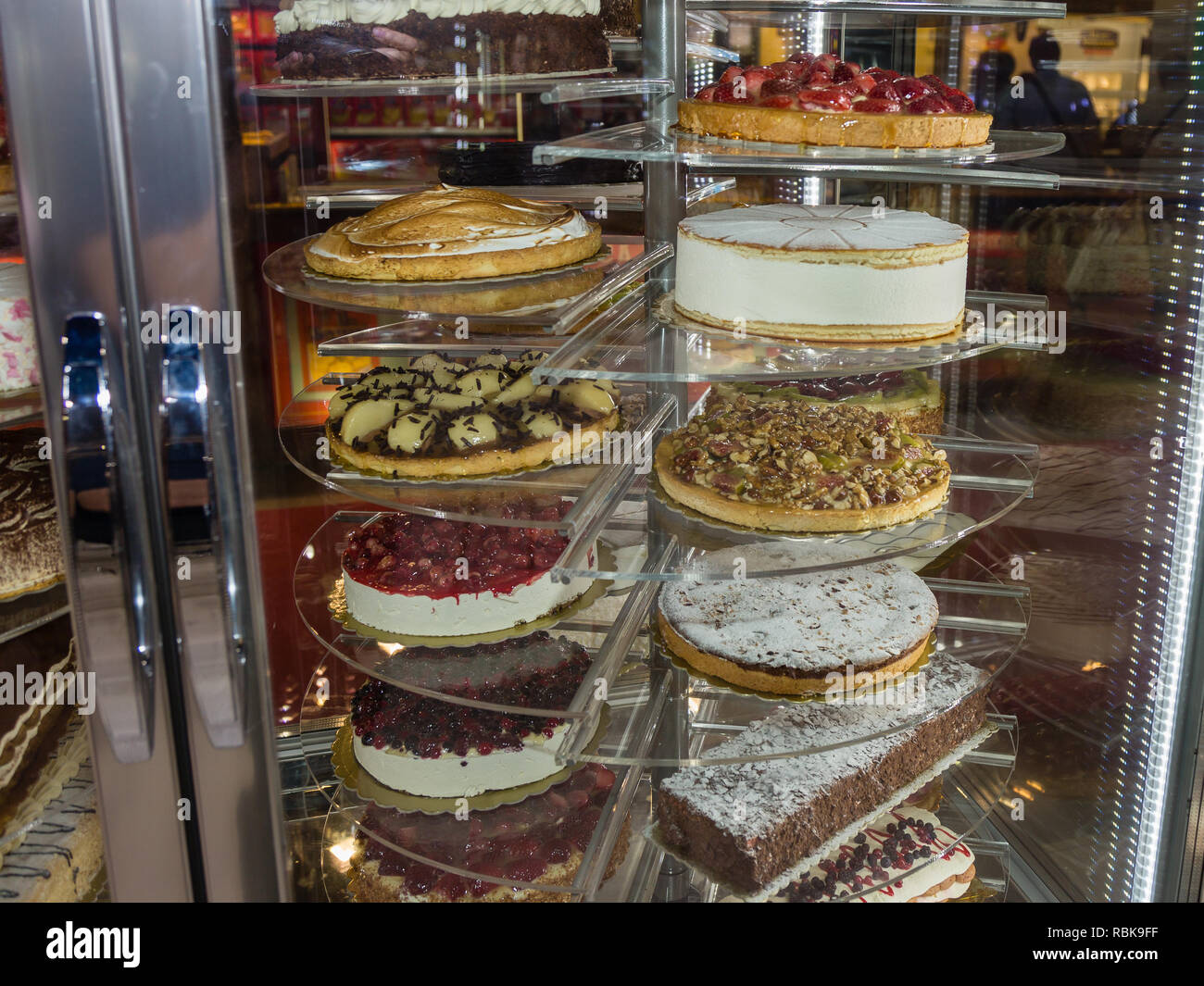 Several Types of Stuffed Cakes inside a Pastry Display Stand Stock ...