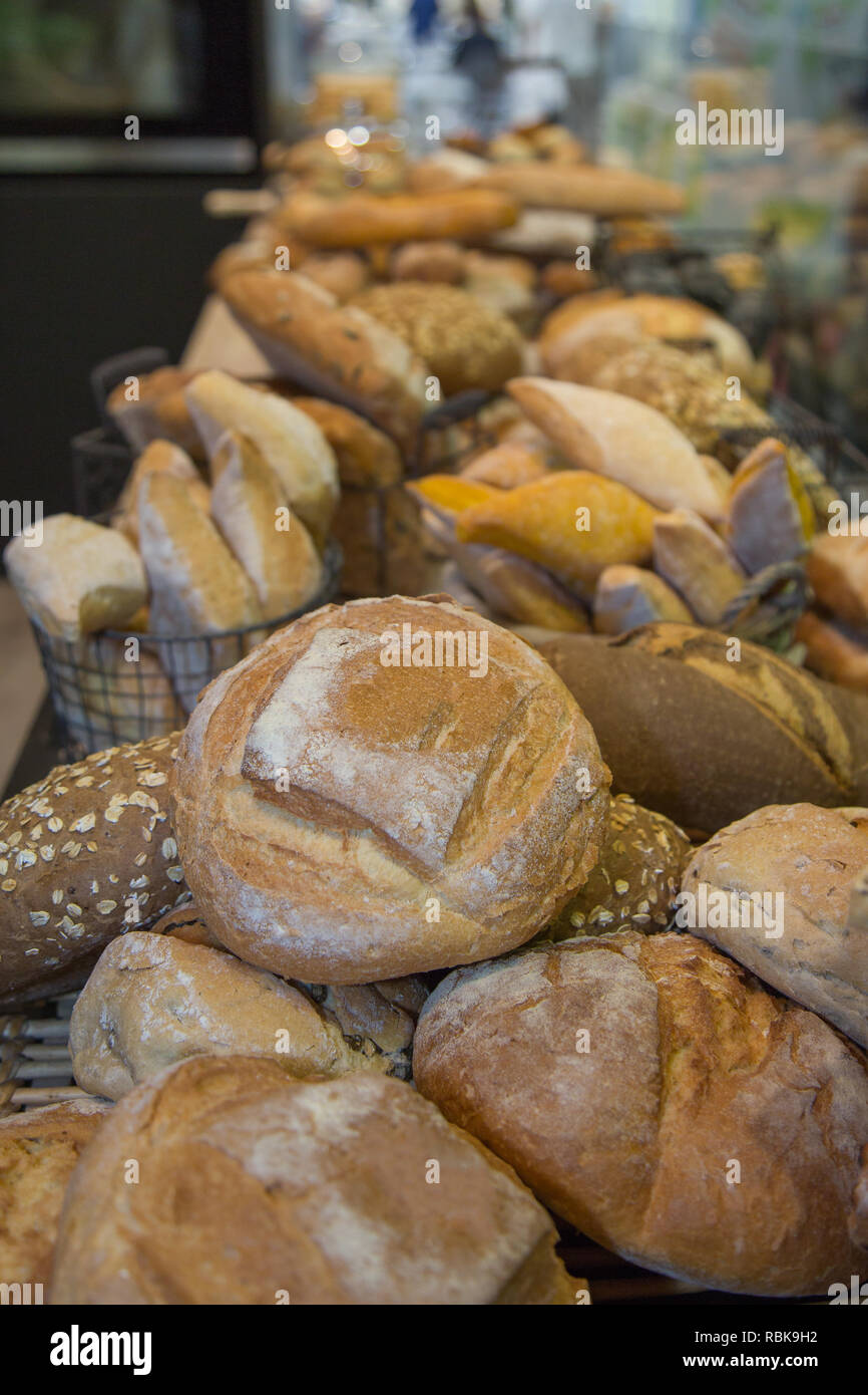 Group of Various Types of Bread, and Loaves inside a Bakery Stock Photo ...