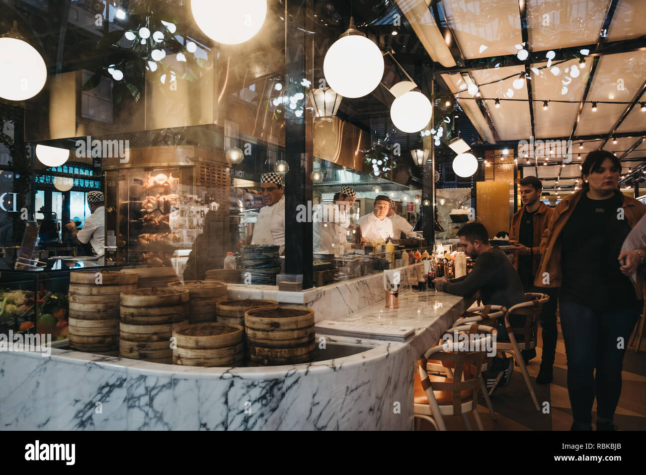 Busy restaurant inside asian hi-res stock photography and images - Alamy