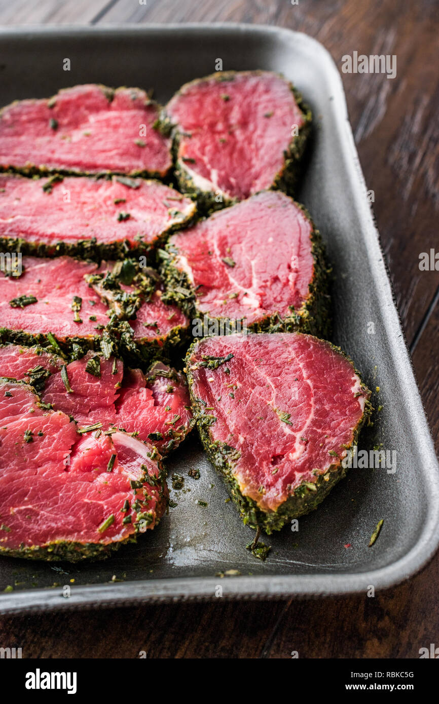 Package of Raw Tenderloin Meat with Herbs and Spices in Plastic Box ...