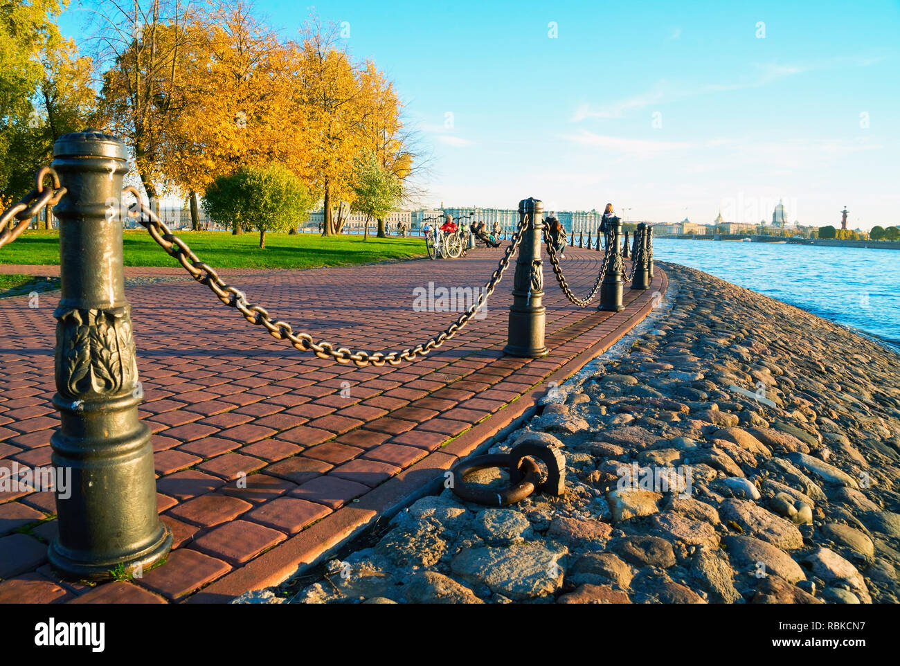 Stone embankment with a fence made of chains. Urban landscape Stock ...