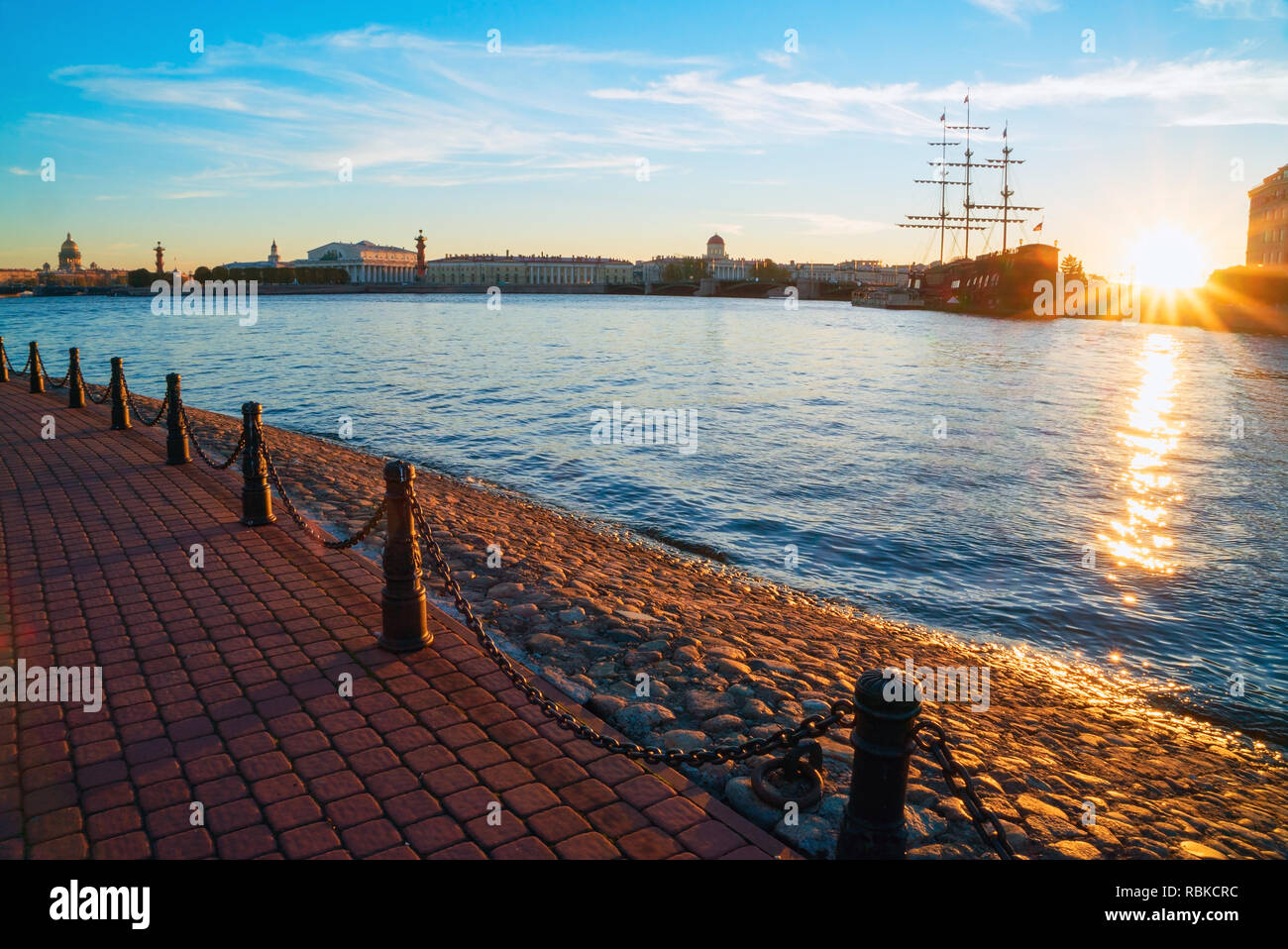 Stone embankment with a fence made of chains. Urban landscape Stock ...