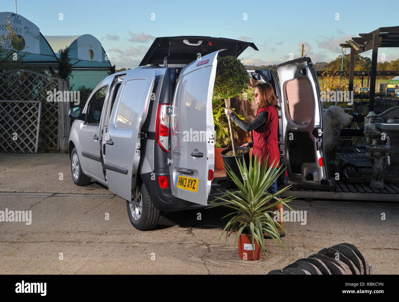 Loading luggage small car hi-res stock photography and images - Alamy