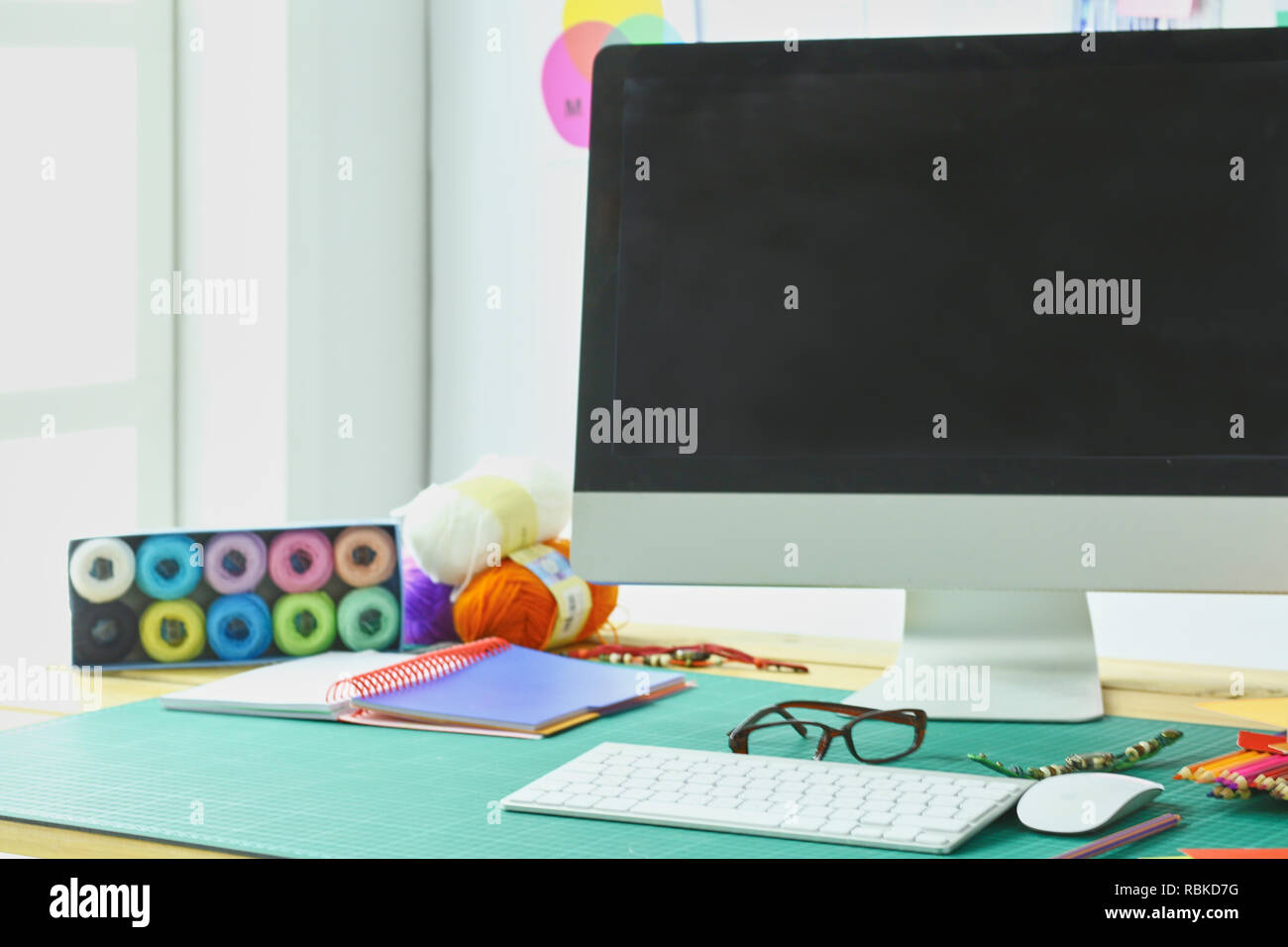 Empty workroom and workplace of tailor or vendor of clothes in small ...