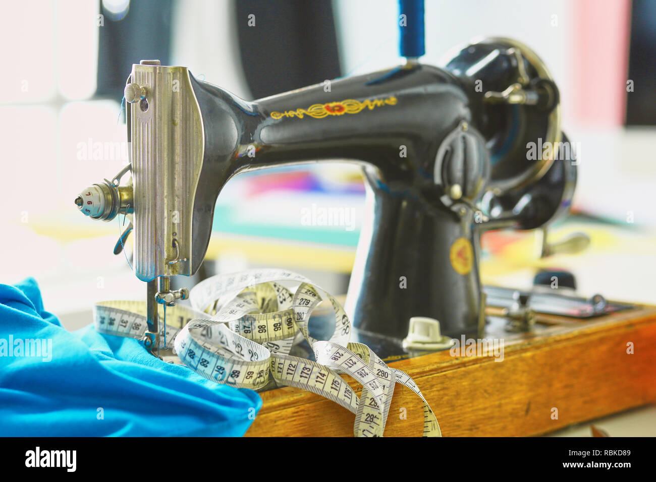 Empty workroom and workplace of tailor or vendor of clothes in small ...