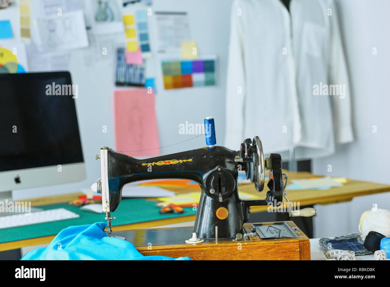 Empty workroom and workplace of tailor or vendor of clothes in small ...