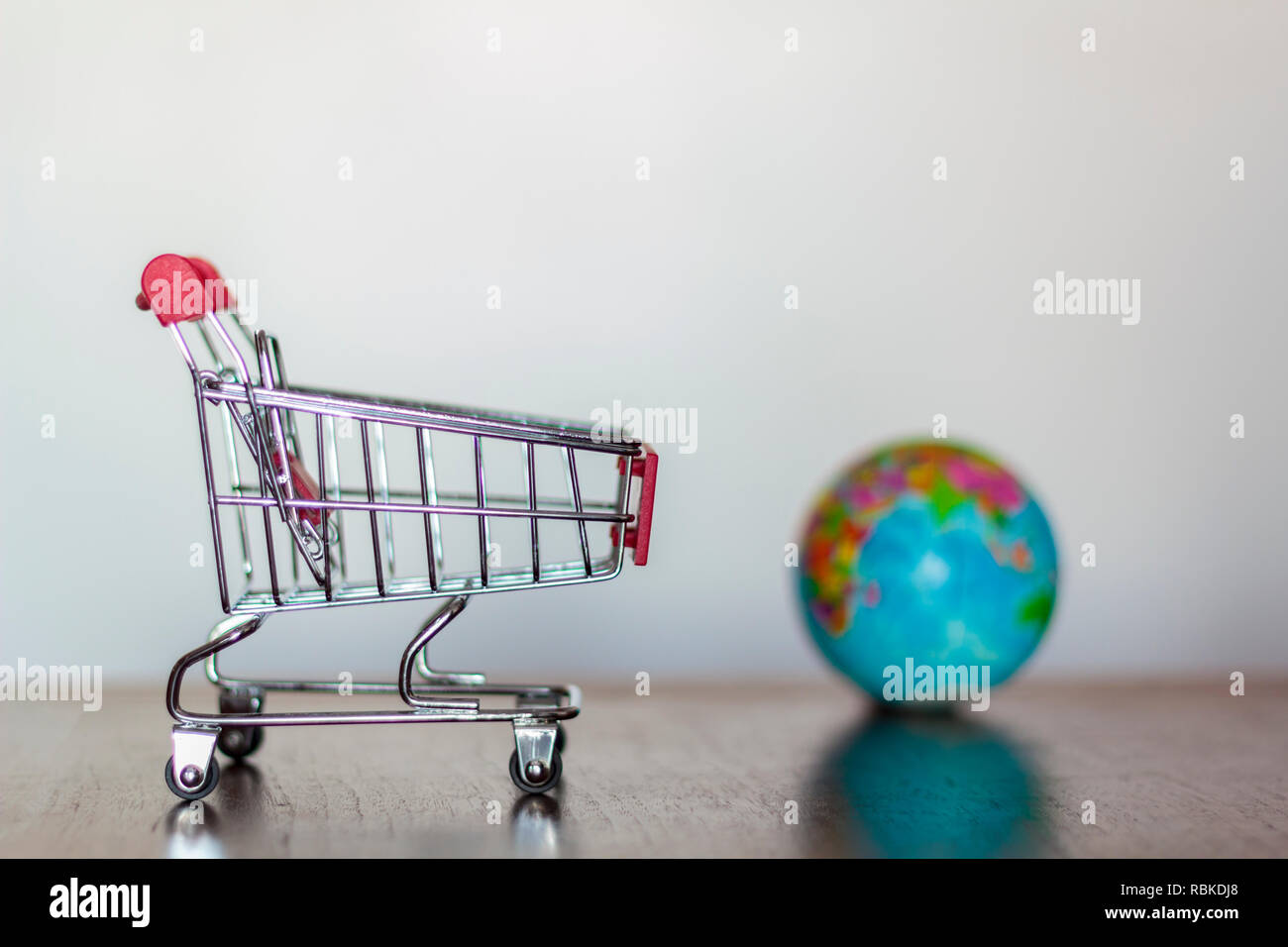 Shopping basket earth planet hi-res stock photography and images - Alamy