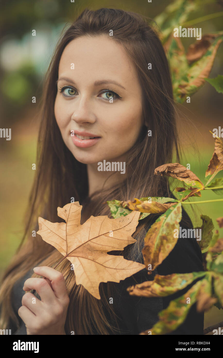 Adorable cute lady woman with brunette hair green eyes pink cheeks rose ...