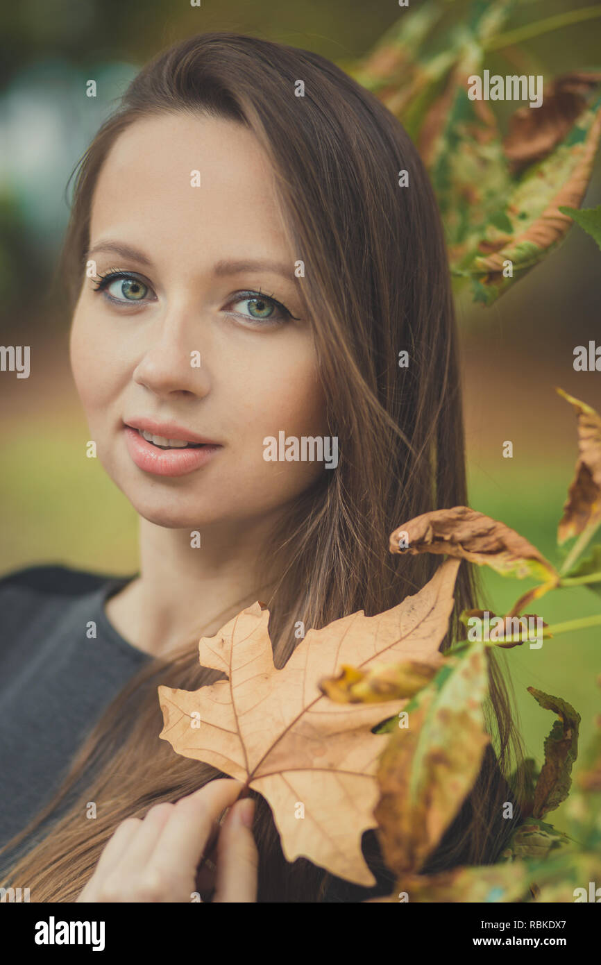Adorable cute lady woman with brunette hair green eyes pink cheeks rose ...
