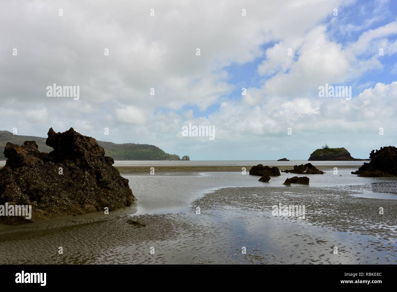 Large limestone boulders on a sandy beach, Hiking through Cape ...