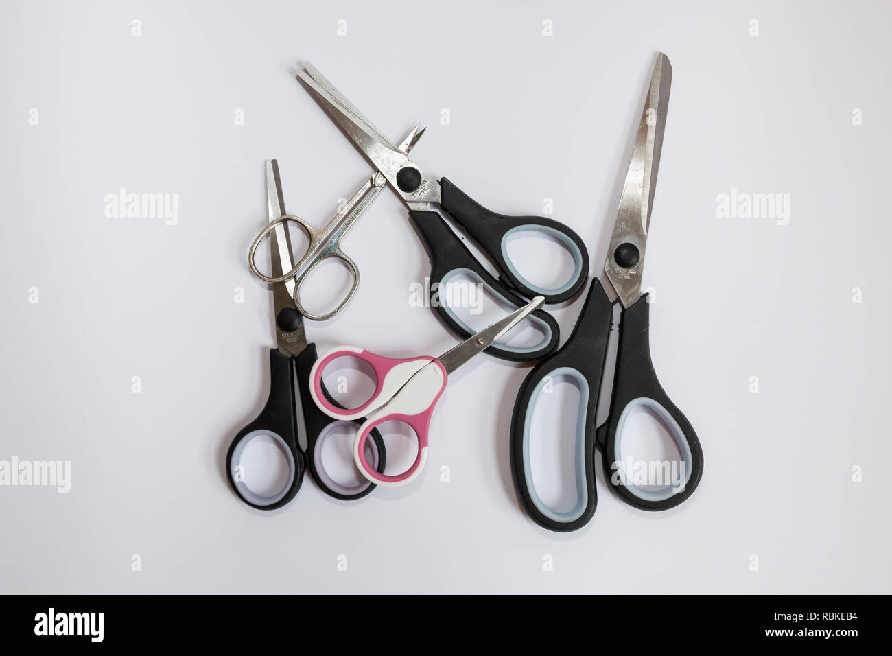 Various sizes of closed scissors isolated on white background Stock ...